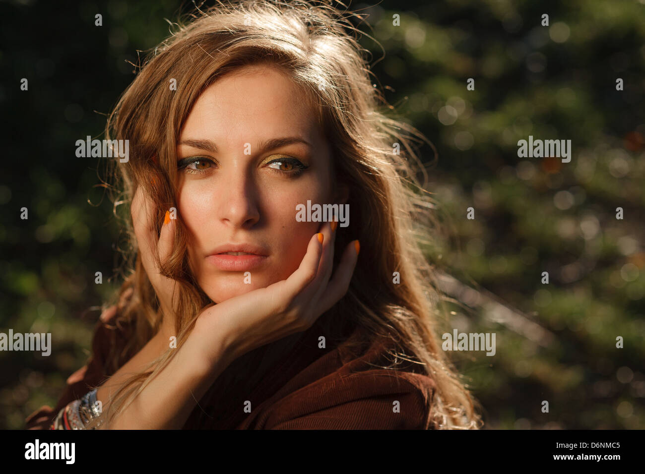 beautiful girl posing looking sideways closeup Stock Photo - Alamy