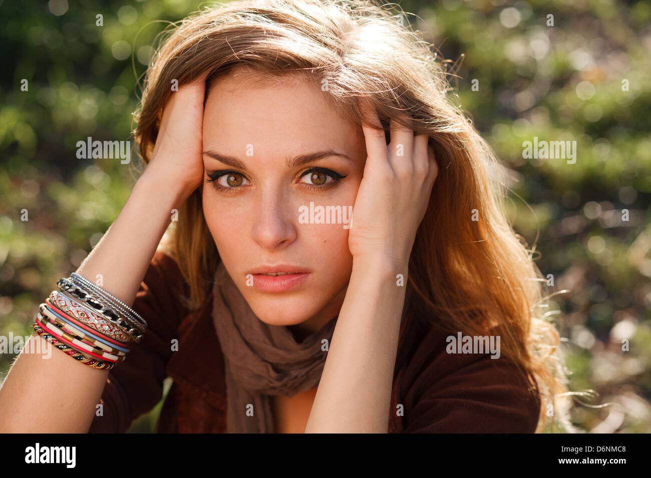 sad girl hands in hair closeup Stock Photo - Alamy