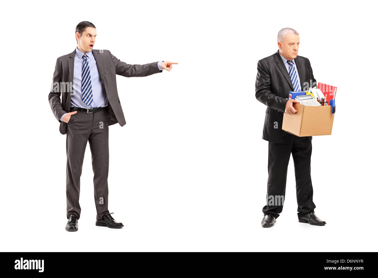Full length portrait of an angry boss firing an employee, isolated on ...