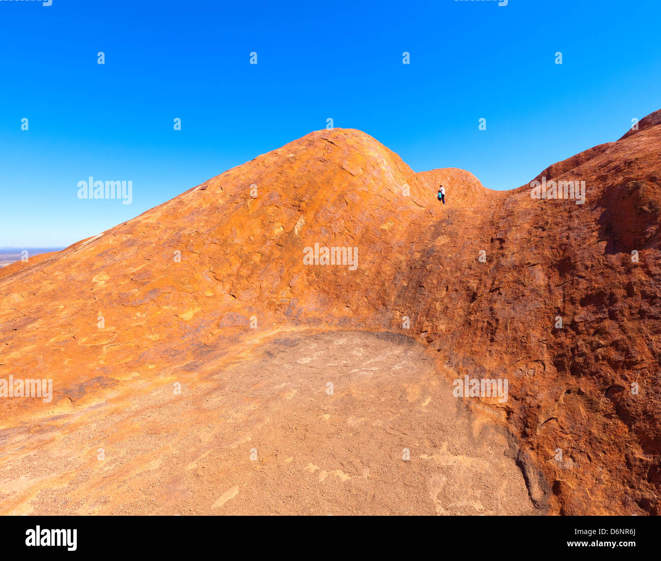 people climbing Uluru outback chain tourists Central Australia ...
