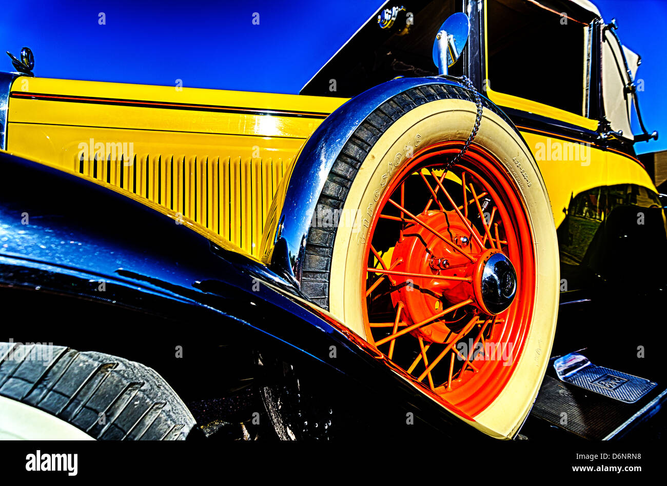 Closeup image of yellow antique car at car show Stock Photo - Alamy