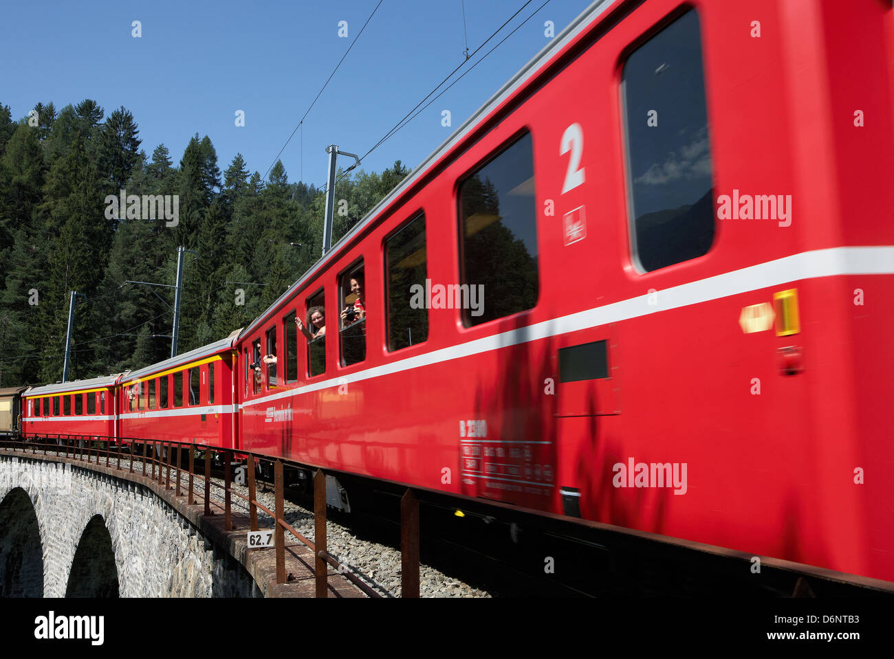 Filisur, Switzerland, the Rhaetian Railway train crossing over the ...