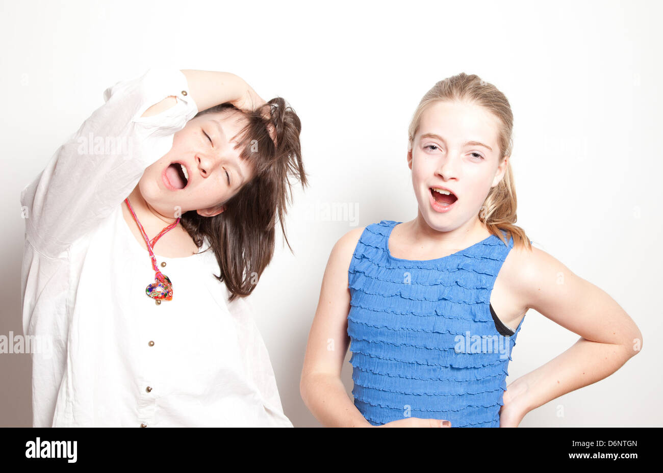 Germany, two tired girls Stock Photo - Alamy