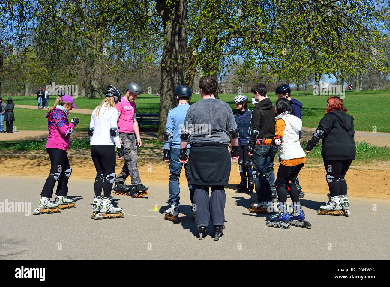 Group learning to rollerblade by The Serpentine, Hyde Park, City of ...