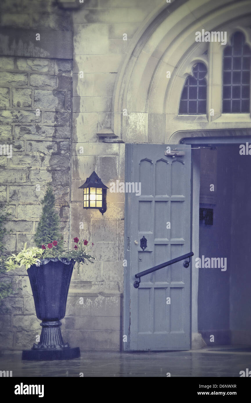 Church entrance with a lantern Stock Photo - Alamy