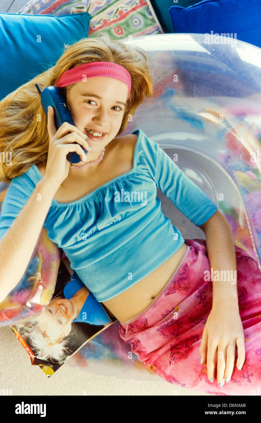 Closeup portrait of teenage girl,on phone, Miami Stock Photo - Alamy