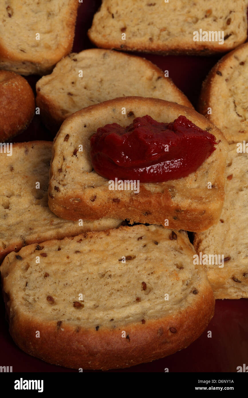 Traditional greek rusks with tomato paste Stock Photo - Alamy