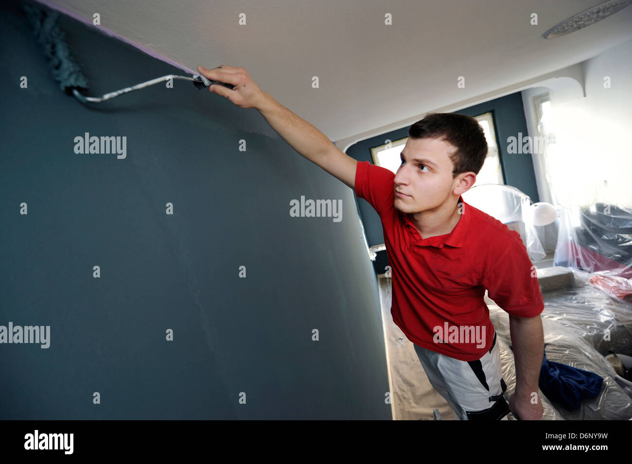 Professional painter during his work Stock Photo - Alamy