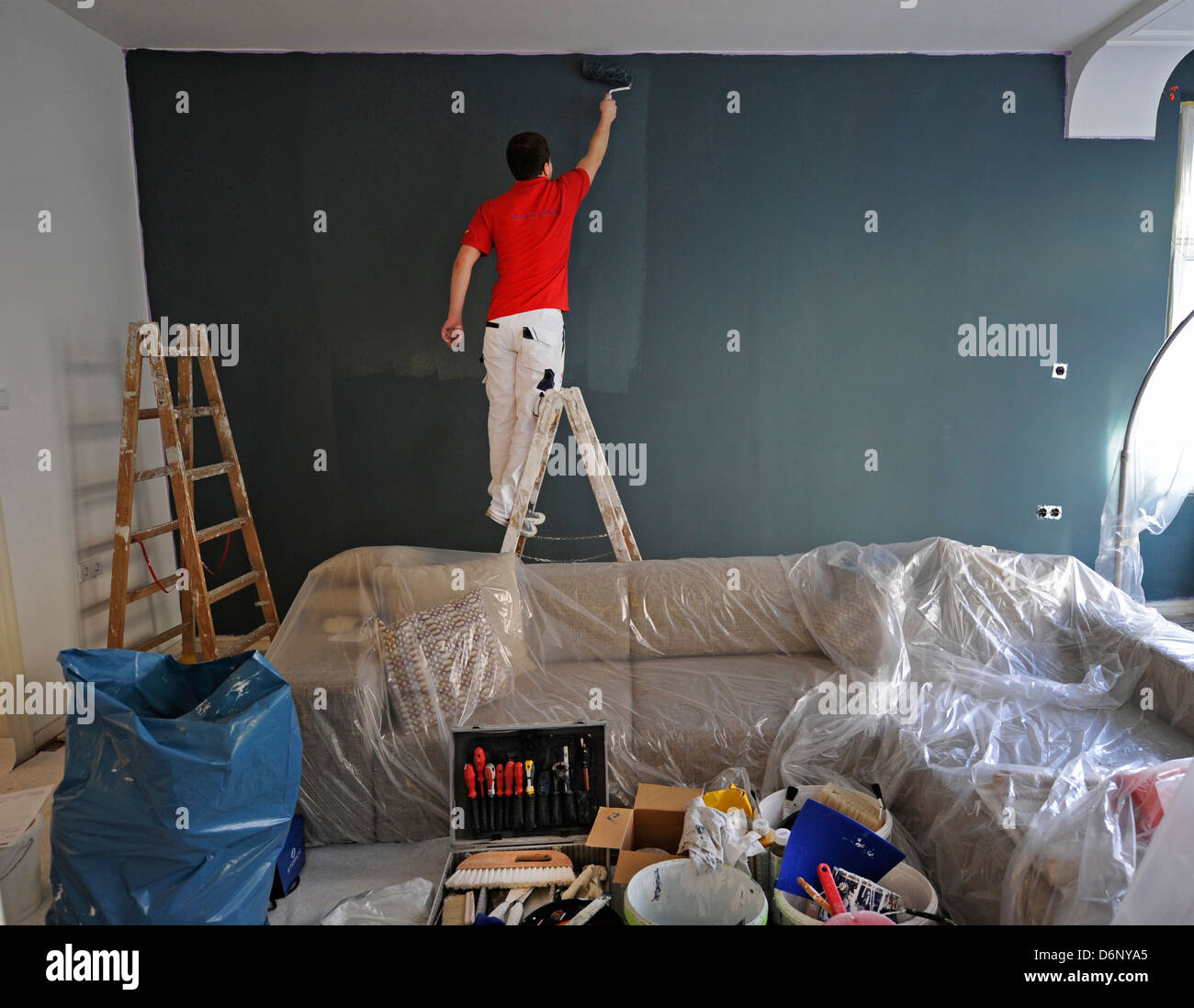 Professional painter during his work Stock Photo - Alamy