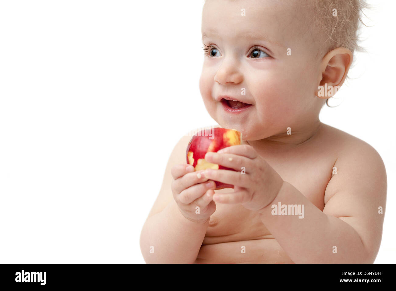 baby eating red apple, isolated on white Stock Photo - Alamy