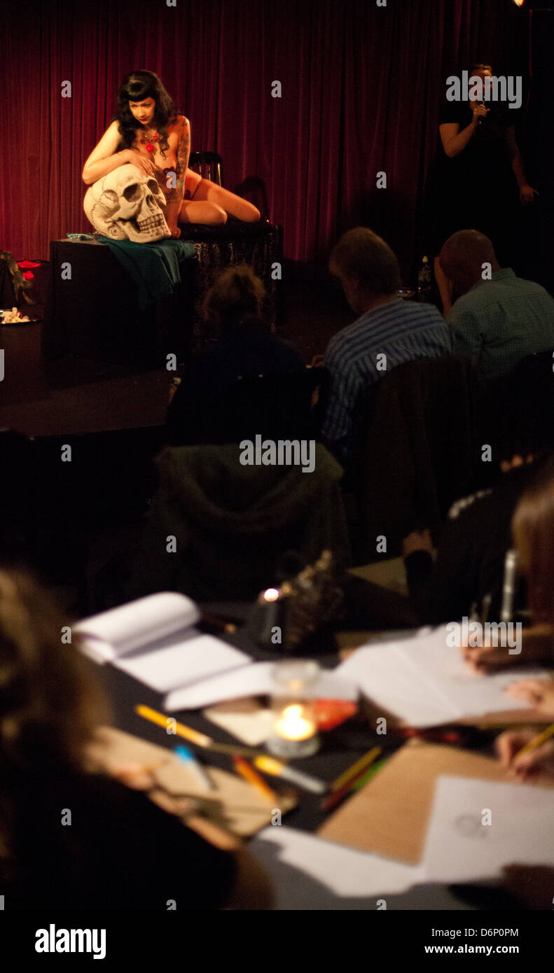 Burlesque performer Anna Fur Laxis poses for artists at a Dr Sketchy's ...