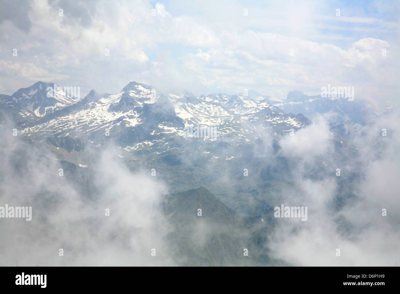 Clouds and pinnacles of French Pyrenees mountains near Pic du midi ...