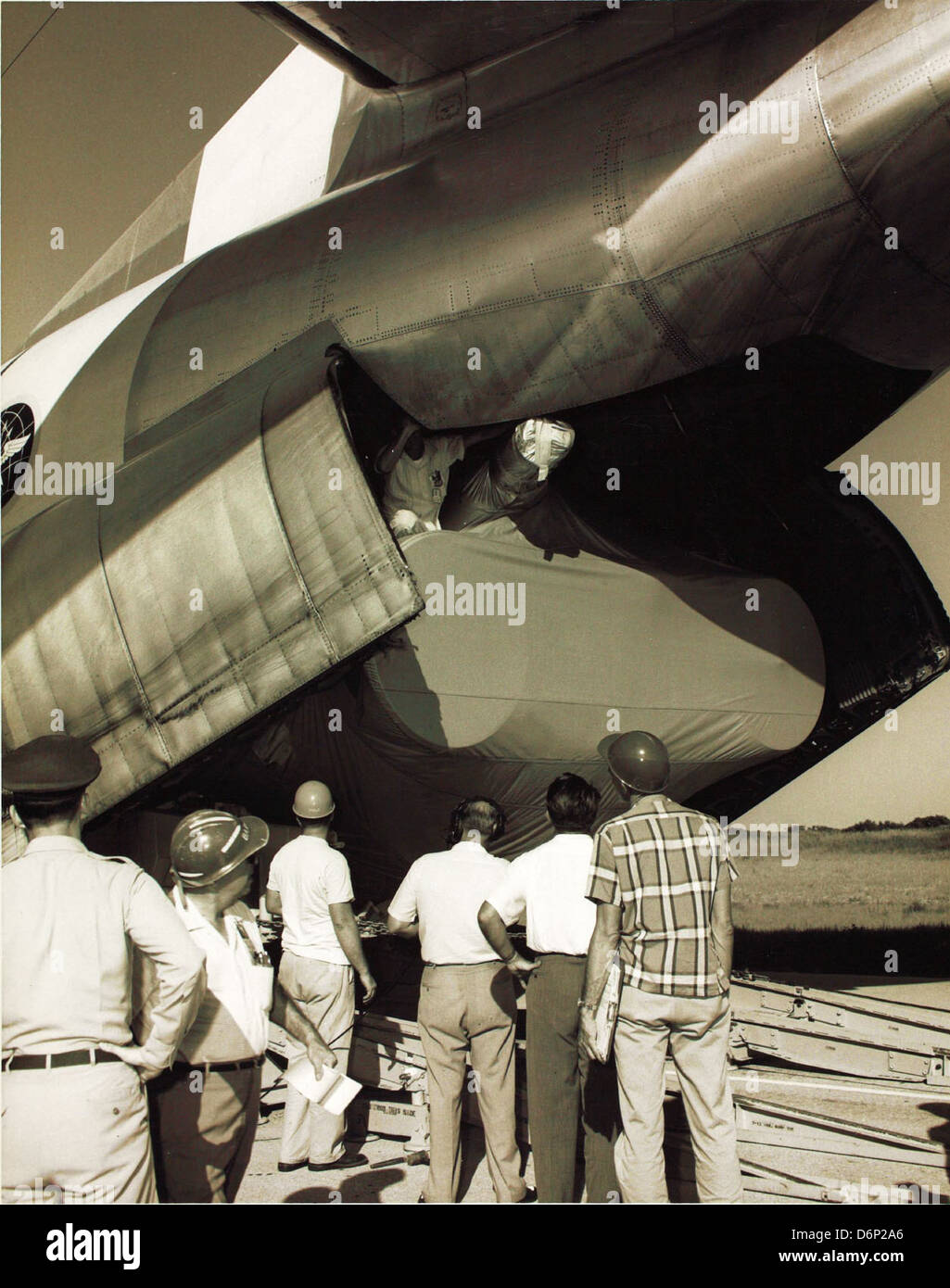 The Convair/General Dynamics Atlas 3E rocket is being unloaded at ...