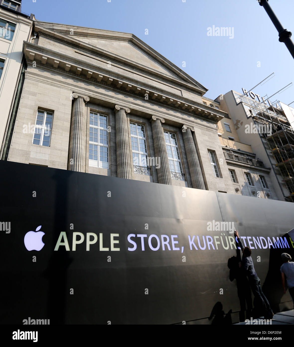 Berlin, Germany. 22nd April, 2013. Employees unveil the logo and ...