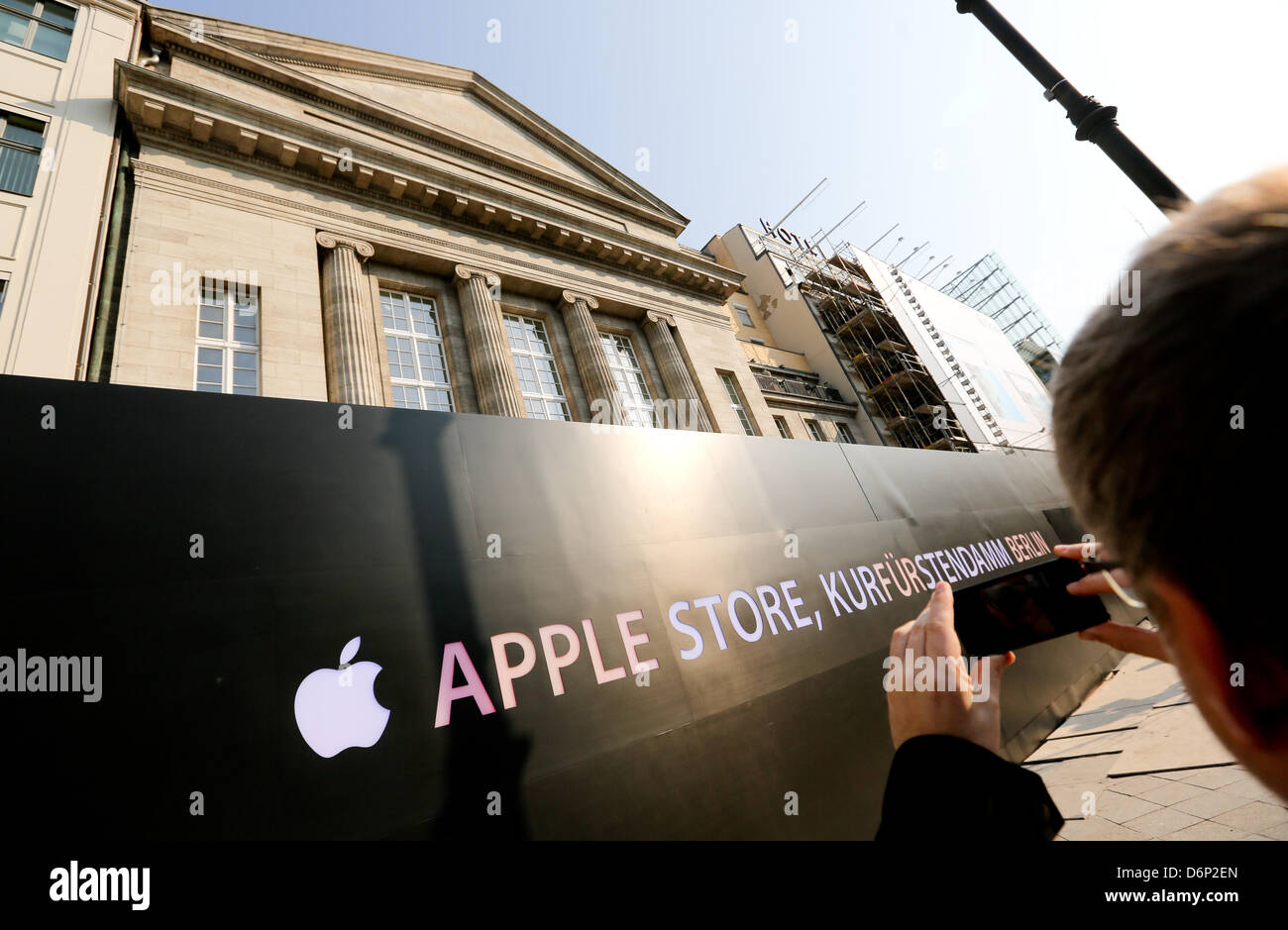 Berlin, Germany. 22nd April, 2013. People take pictures of the logo and ...