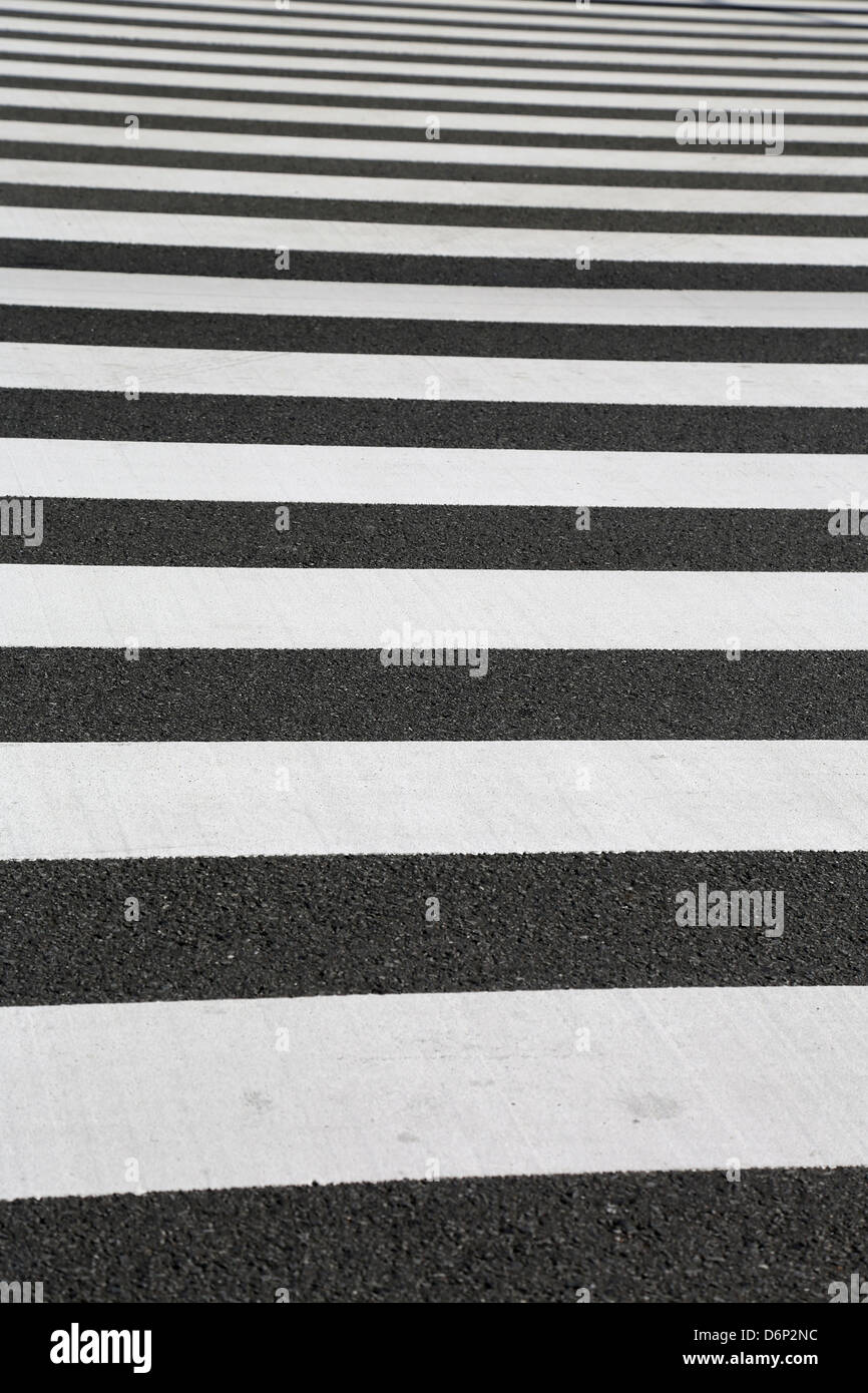 Black and white lines of a Japanese zebra pedestrian crossing in Ginza ...