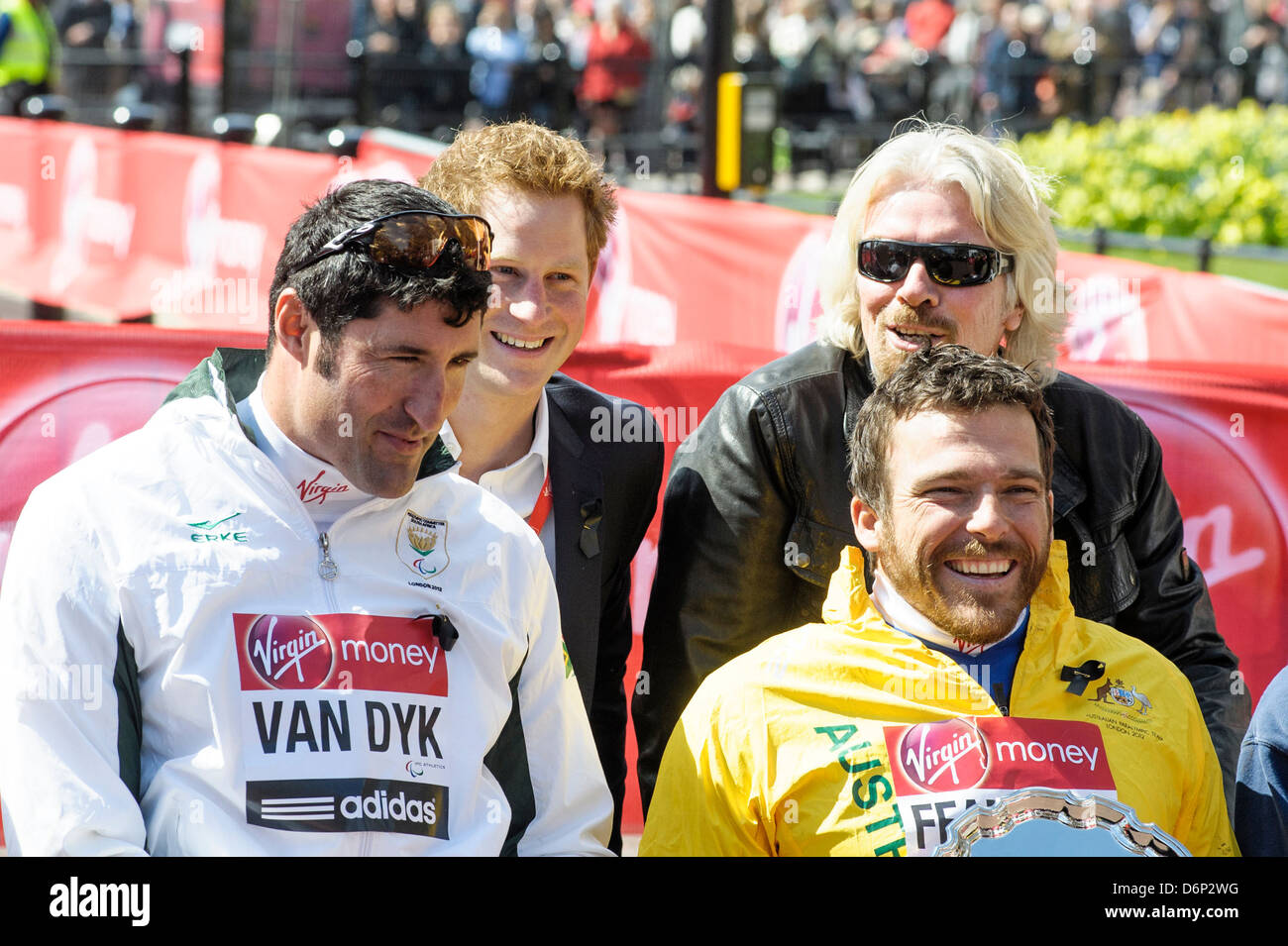 Prince Harry presents a medal to the Mens Elite Wheelchair winner Kurt ...