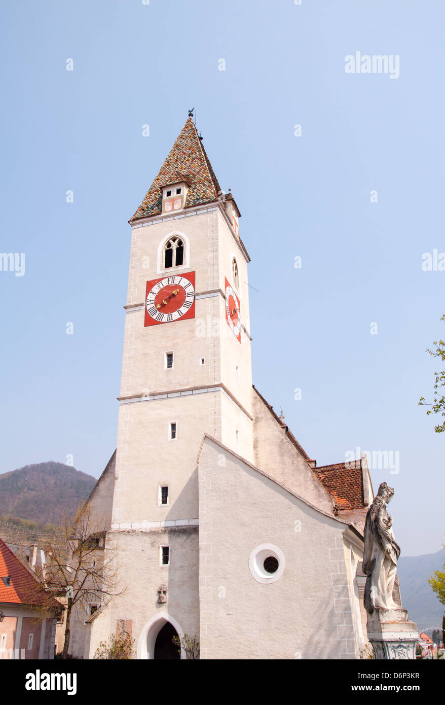 gothic bell tower of church in spitz, austria with tiled roof Stock ...