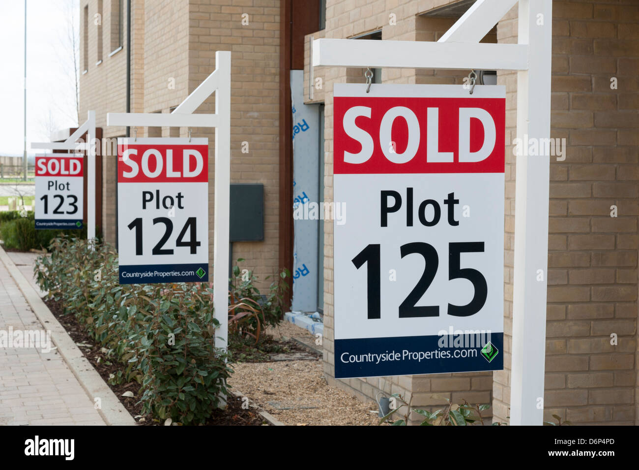 Sold signs on building plots at new housing development at Great ...
