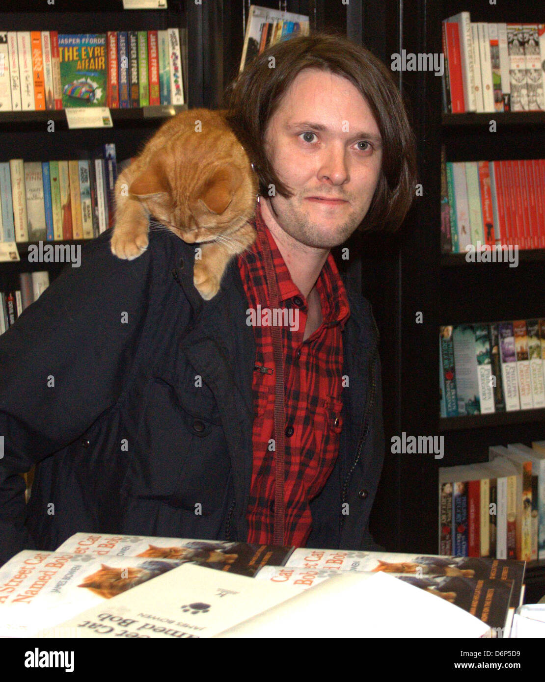 James Bowen and Bob attend a busy signing at Islington Waterstone's ...