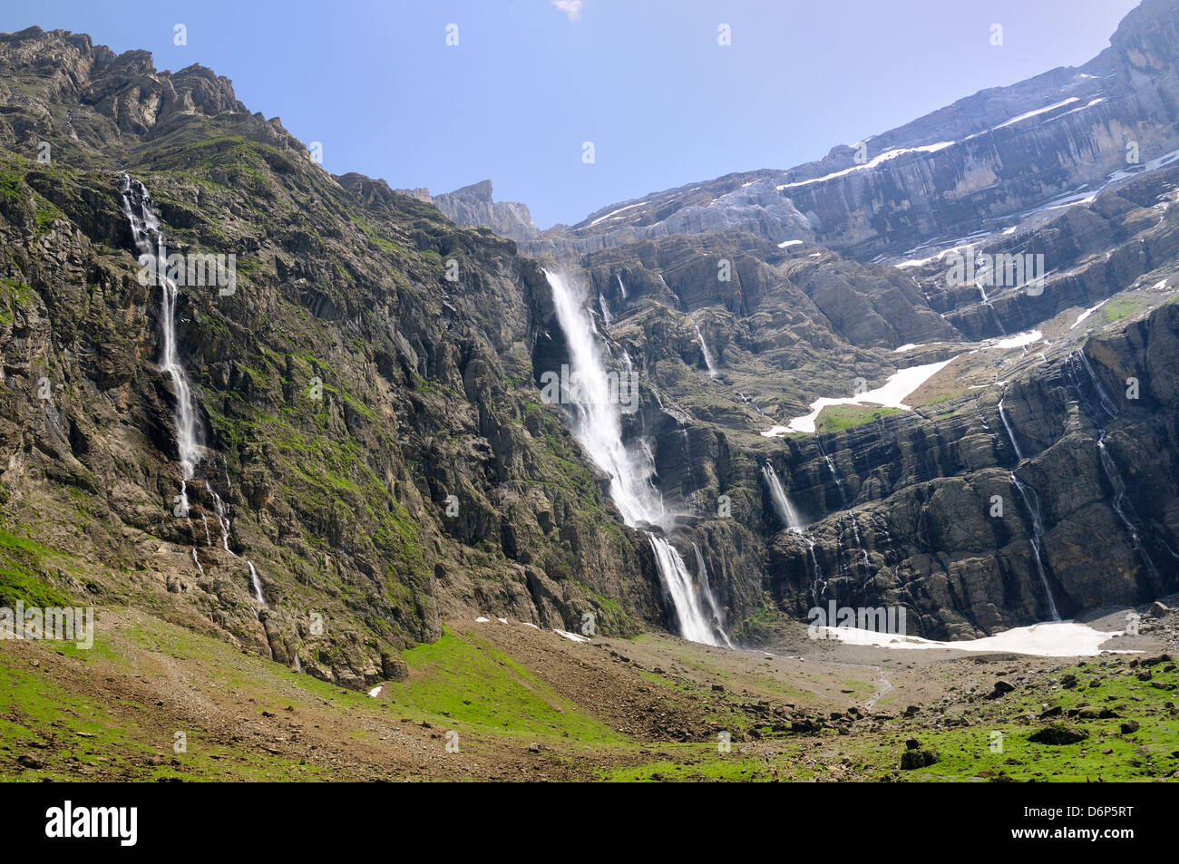 Waterfalls cascade down the karst limestone cliffs of the Cirque de ...