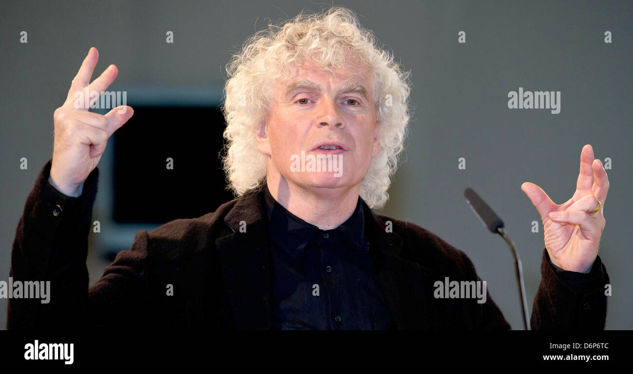 Sir Simon Rattle, head conductor of the Berlin Philharmonic Orchestra ...