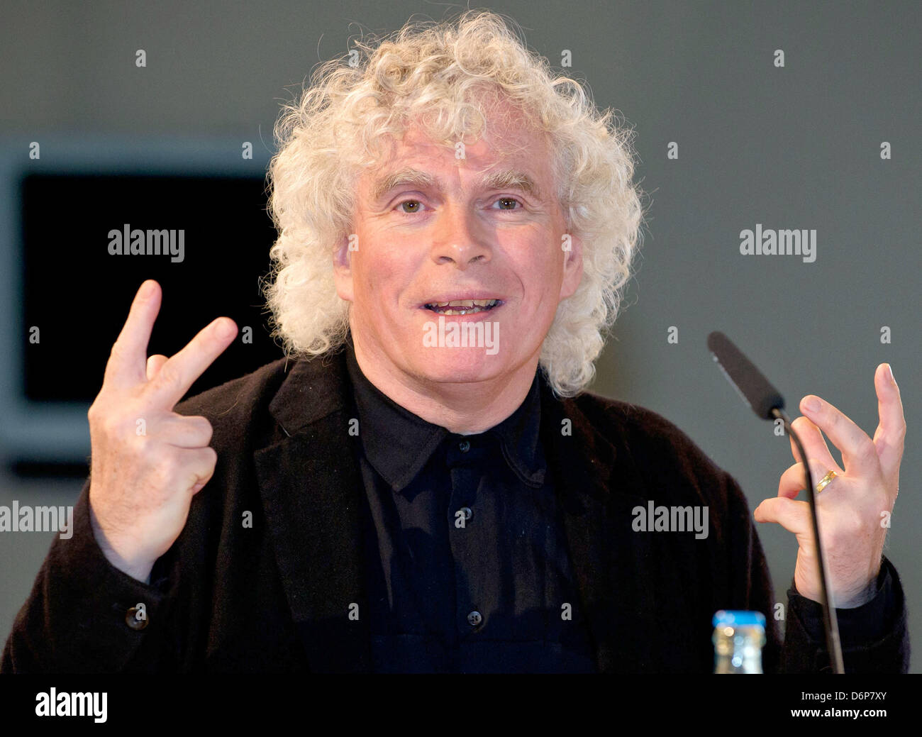 Sir Simon Rattle, head conductor of the Berlin Philharmonic Orchestra ...