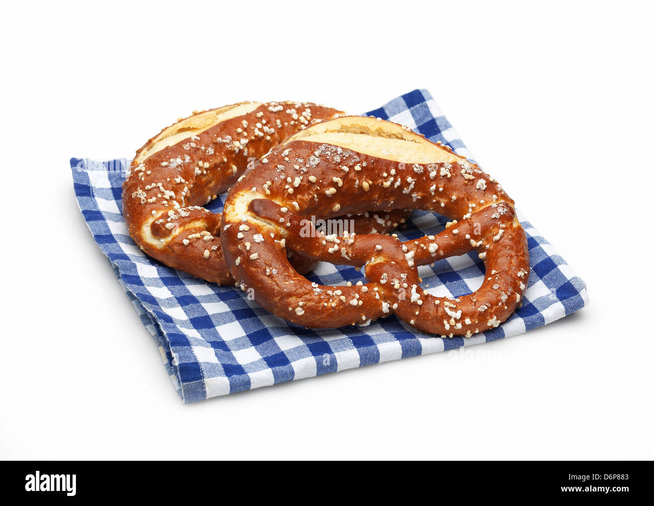 traditional german bread(bretzel) on a white and blue napkin Stock ...