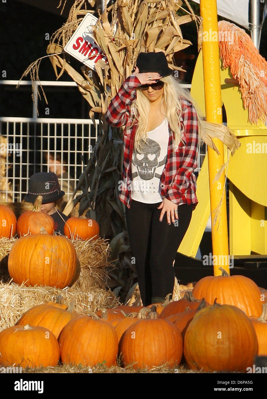 Christina Aguilera and her boyfriend spend an afternoon with her son Max Bratman at Mr Bones ...