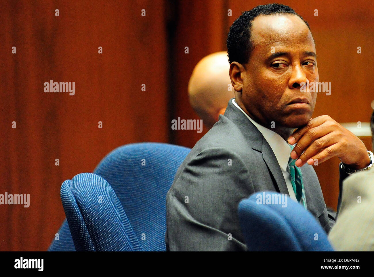 Dr. Conrad Murray turns to look behind with proceeding underway during ...