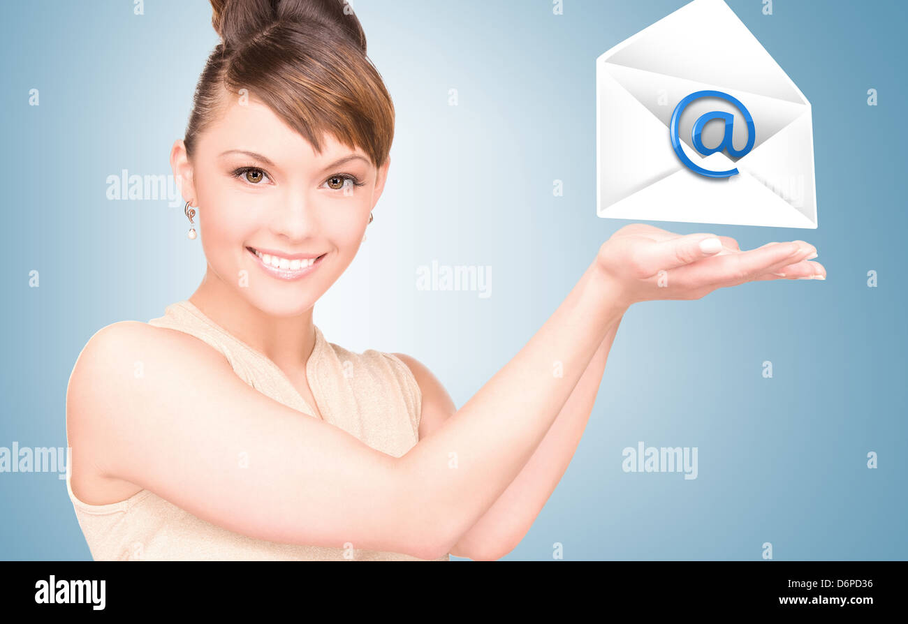 woman showing virtual envelope Stock Photo - Alamy