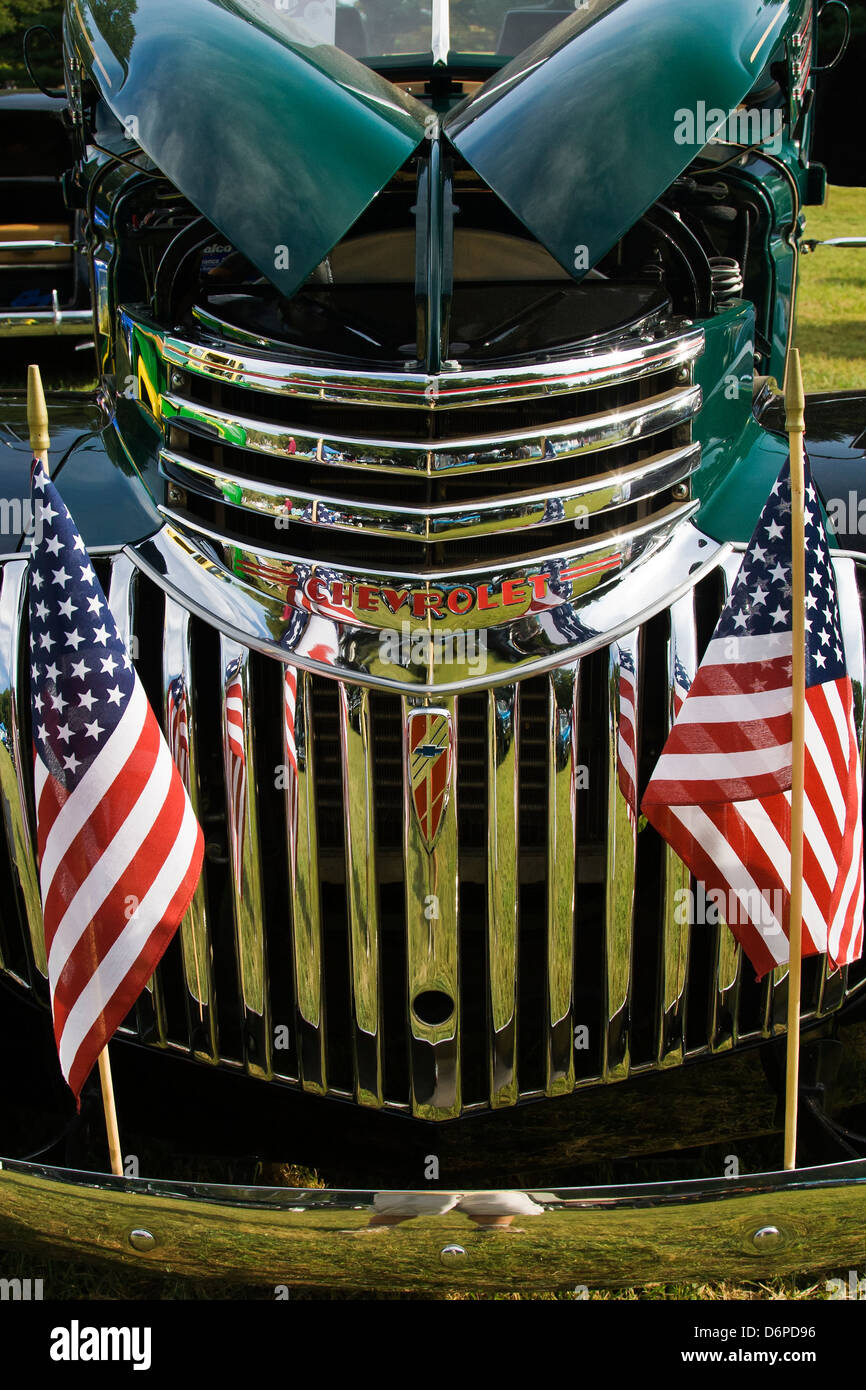 antique Chevrolet car with American flags Stock Photo - Alamy