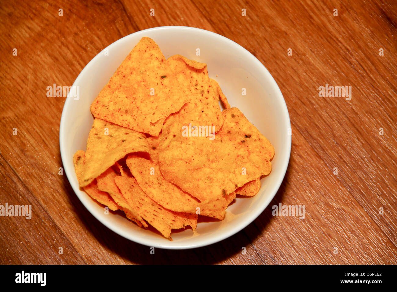 White bowl of nacho corn chips Stock Photo - Alamy