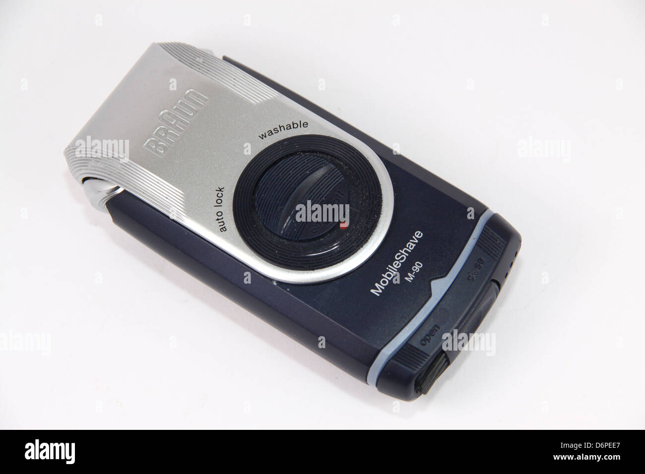 Braun battery operated electric travel shaver Stock Photo - Alamy