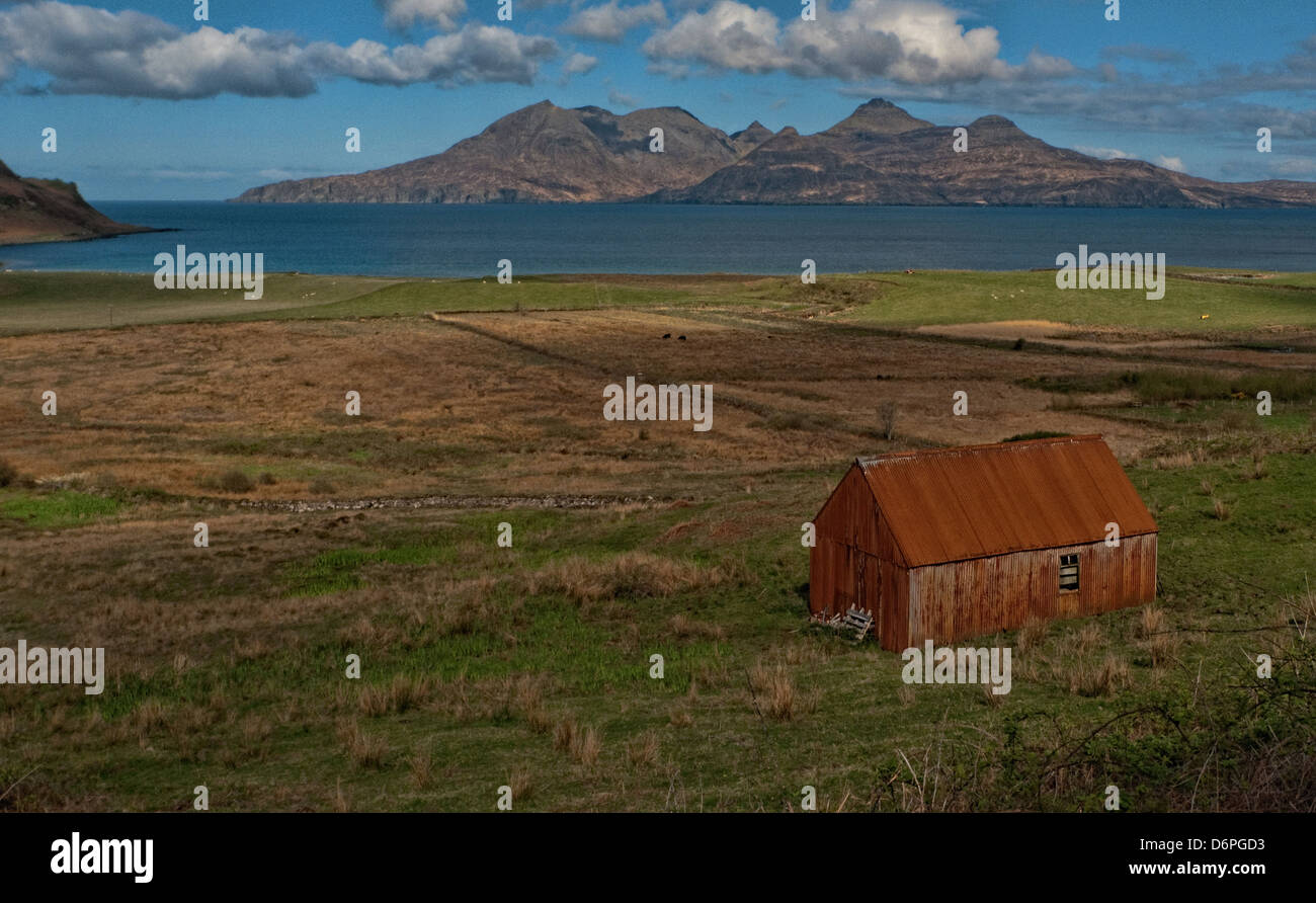 Red Hut and Rhum from Eigg Stock Photo - Alamy