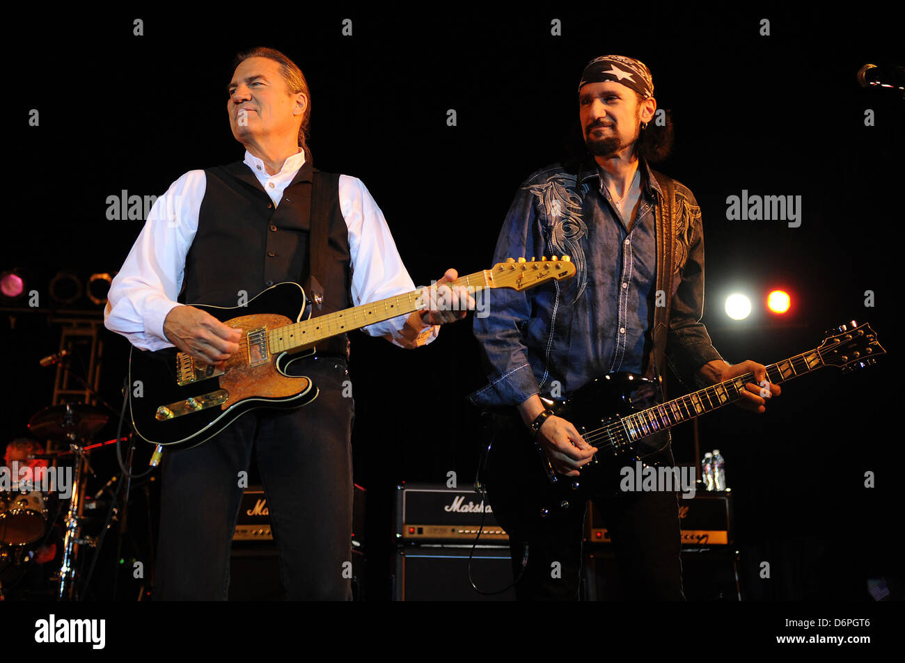 Max Carl and Bruce Kulick of Grand Funk Railroad perform at the ...