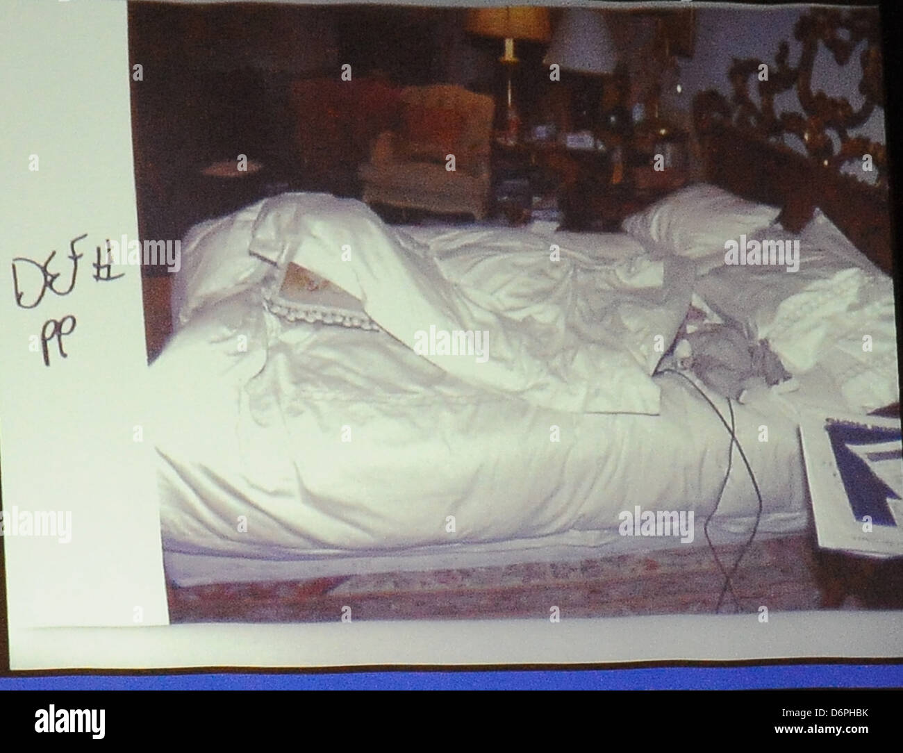 A photograph of Michael Jackson's bedroom is projected as Defense ...