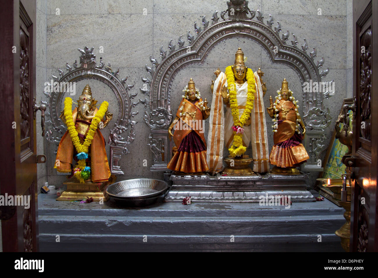 Hindu altar in a temple Stock Photo - Alamy