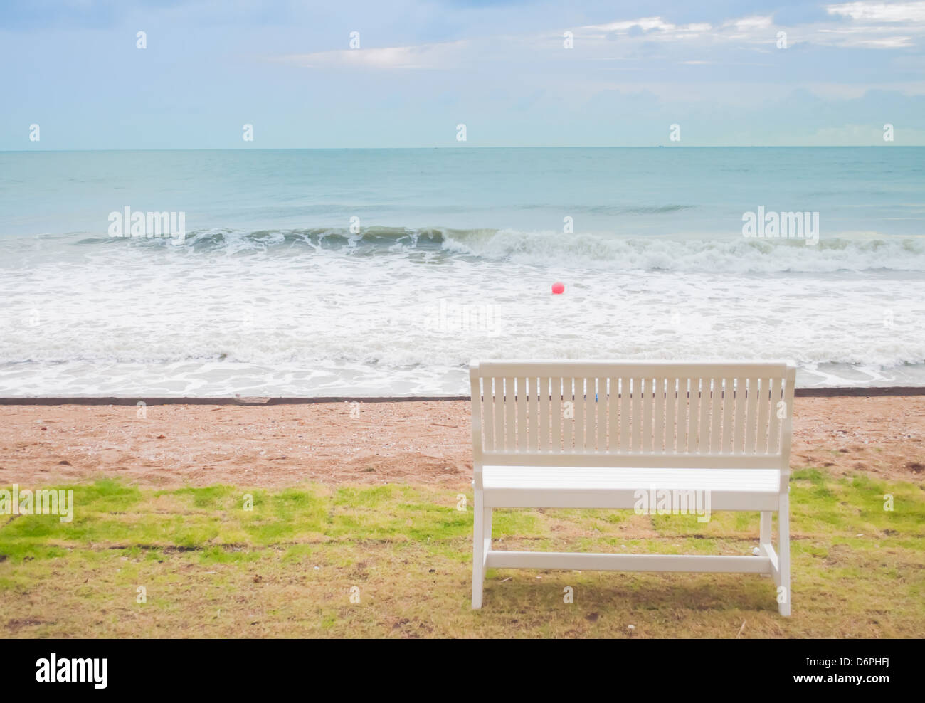 A white wooden bench on the beach Stock Photo - Alamy
