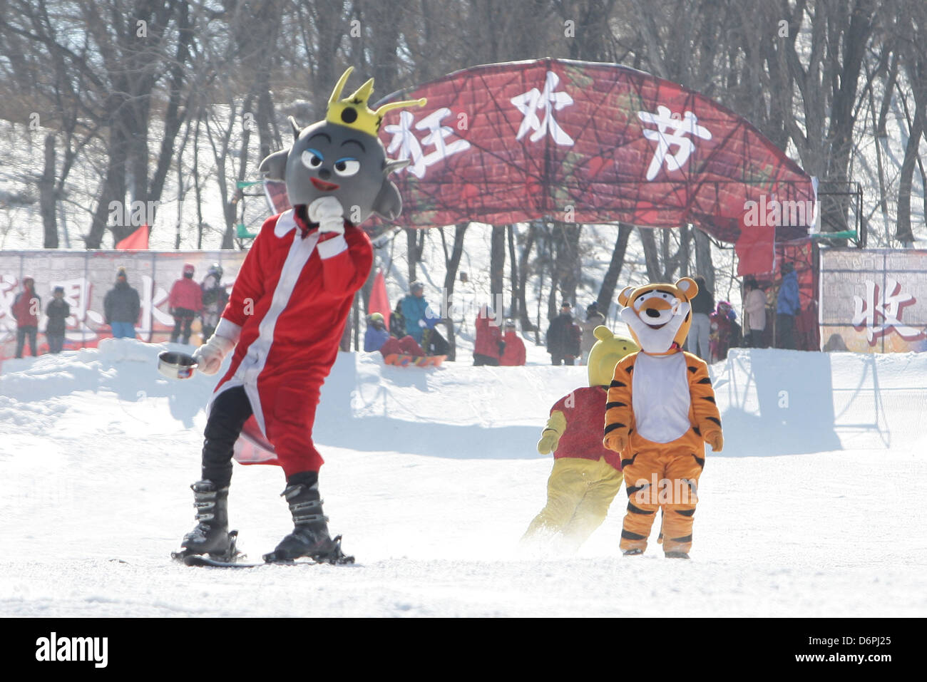 Competitors dress up in costumes at the Bikini Ski Contest Competitors ...