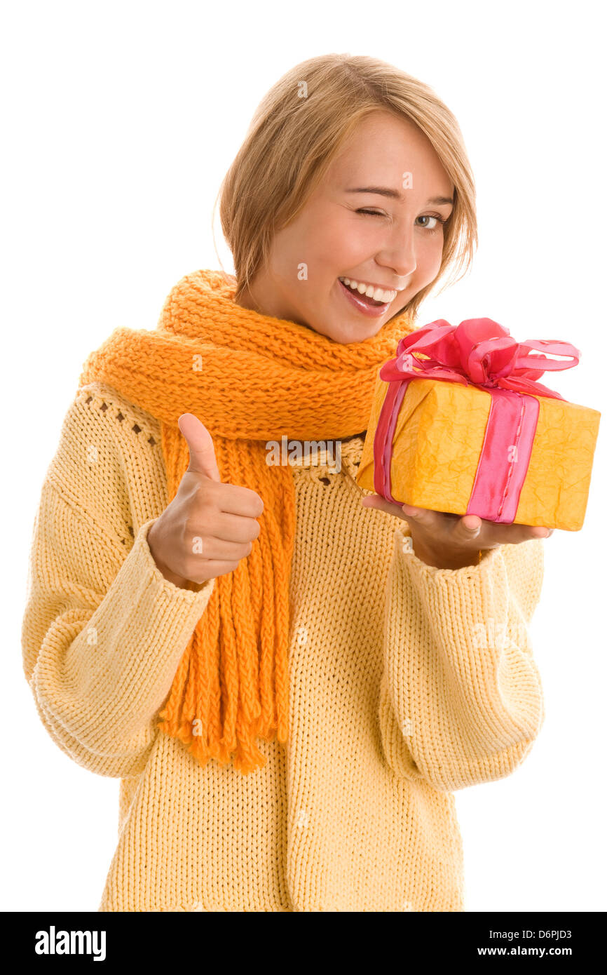 Woman with gift giving thumbs up Stock Photo - Alamy
