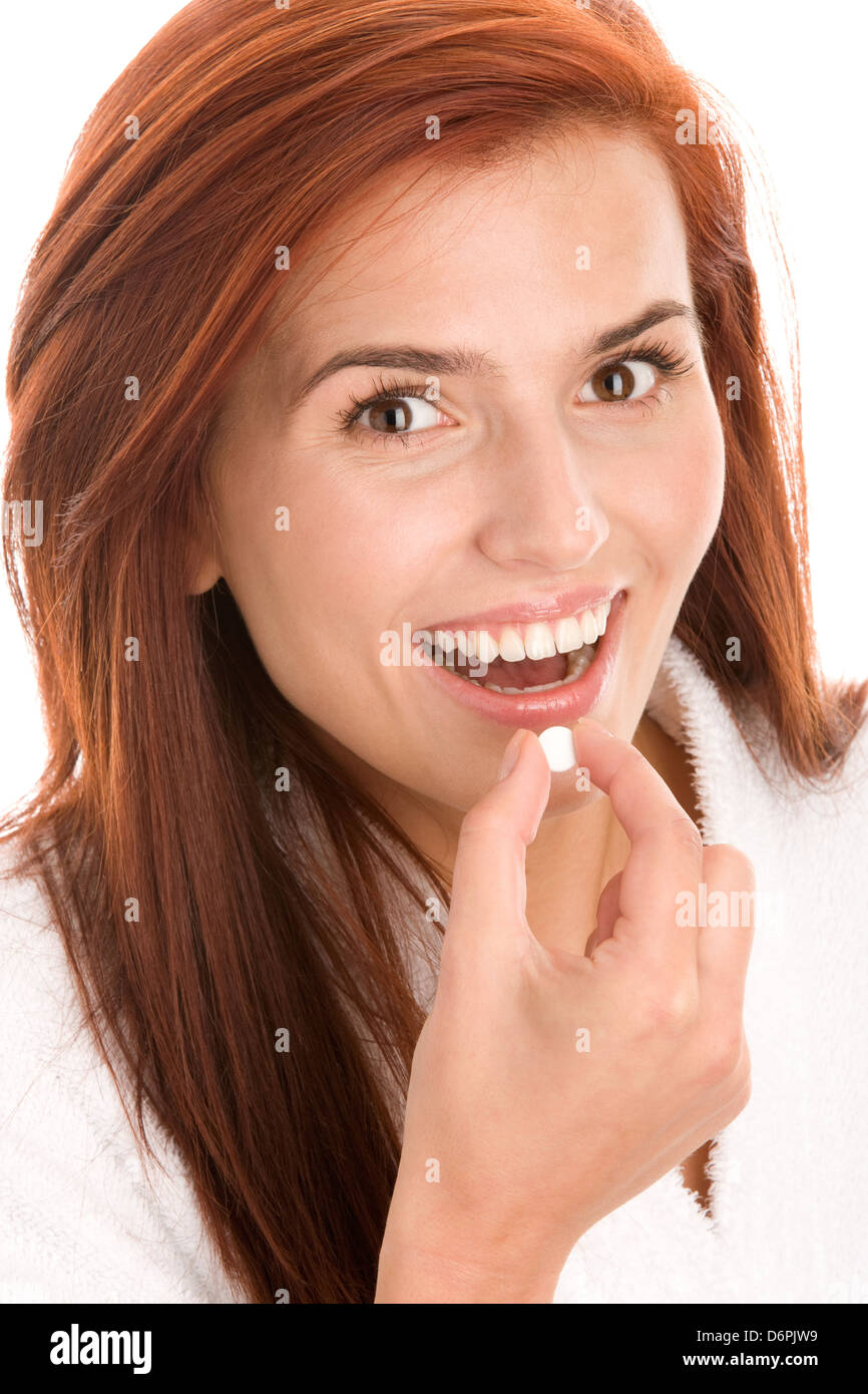Woman with pill Stock Photo - Alamy