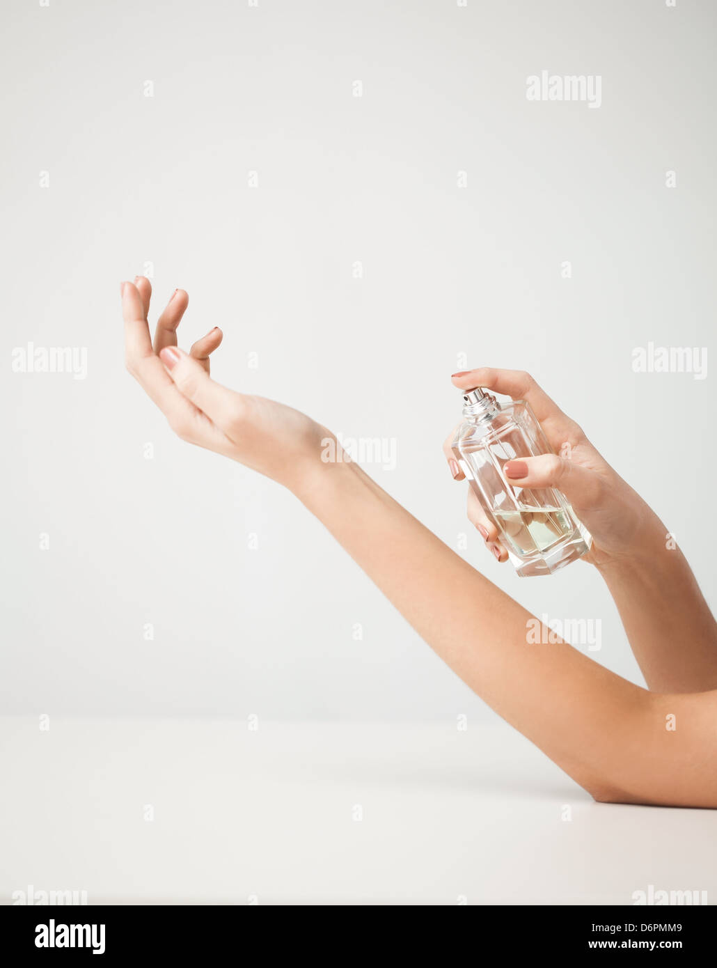 woman hands spraying perfume Stock Photo - Alamy
