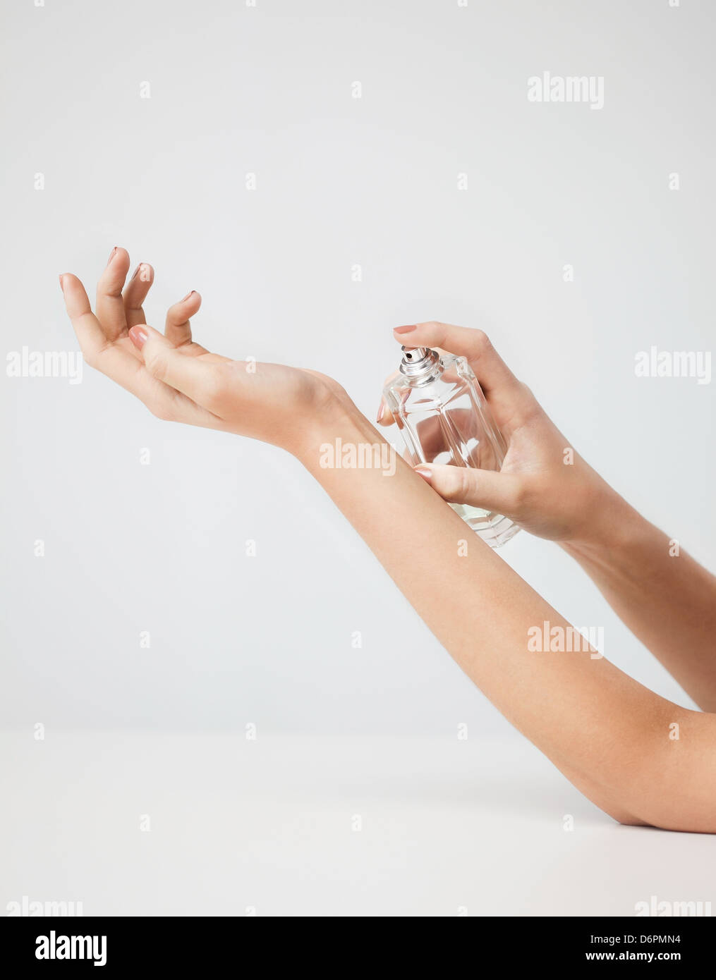 woman hands spraying perfume Stock Photo - Alamy