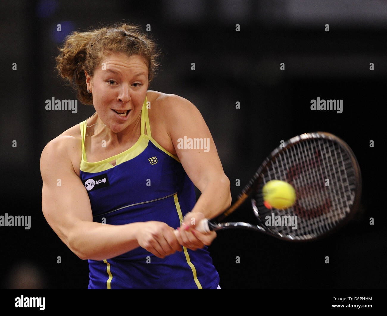 Germany's Anna-Lena Friedsam returns the ball during the match against ...
