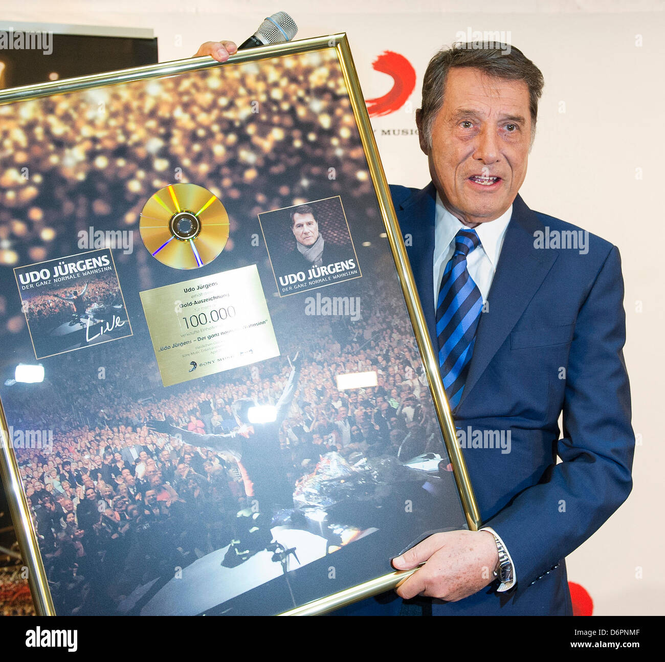 Singer Udo Juergens holds a golden record in Munich, Germany, 22 April ...