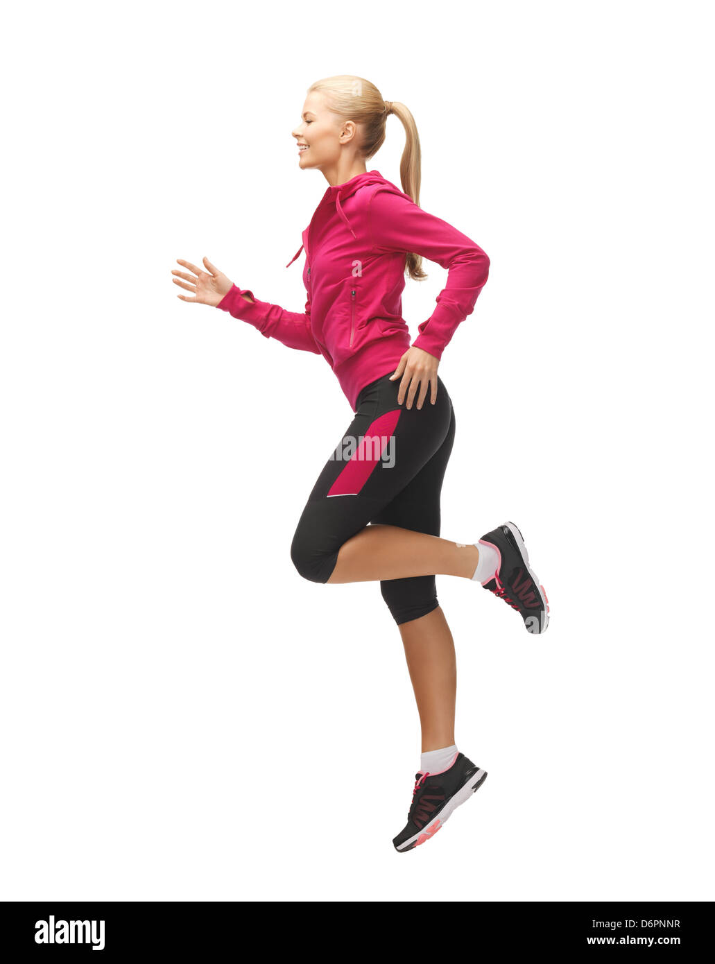 sporty woman running or jumping Stock Photo - Alamy