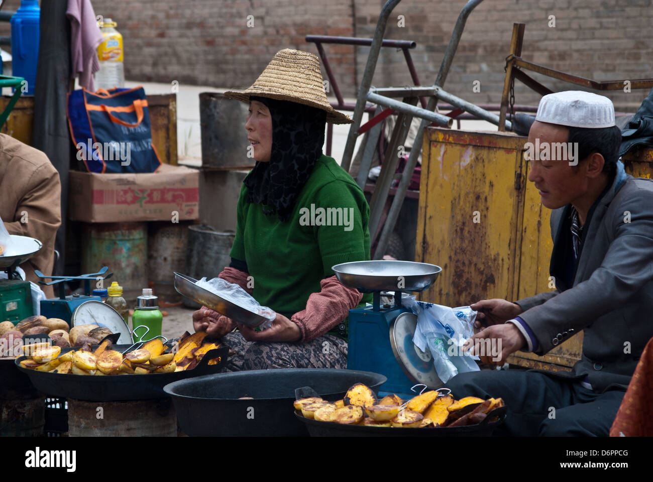 Muslim food vendor, street kitchen, market near Ta'er monastery, Xining ...