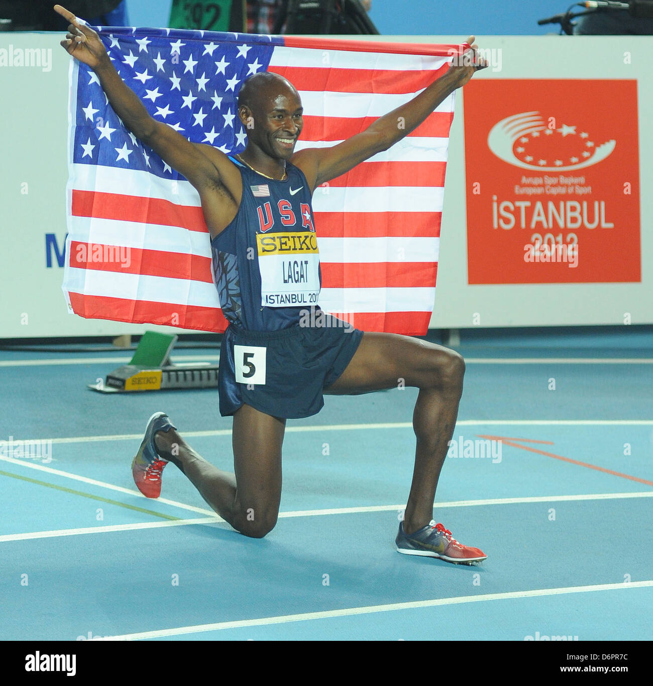 Bernard Lagat of the US celebrates after winning the gold medal in the ...