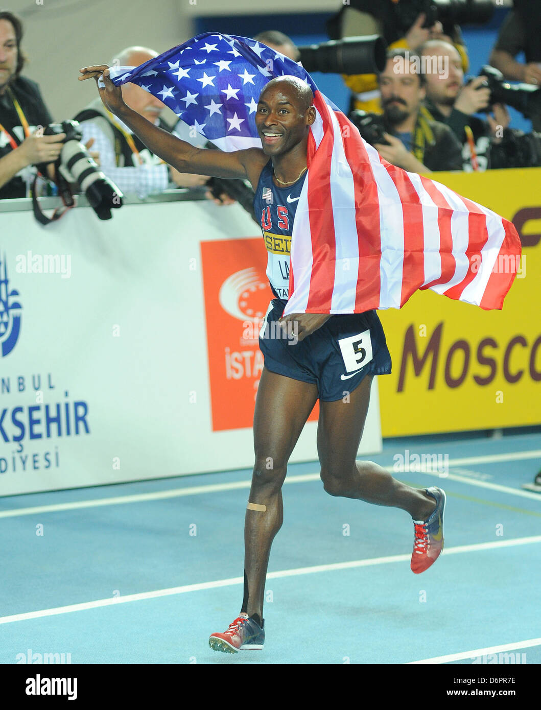 Bernard Lagat of the US celebrates after winning the gold medal in the ...